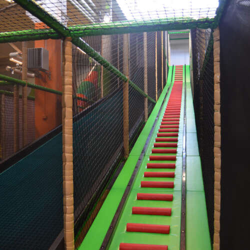 Donut glider, slide down in a donut in the indoor play structure!